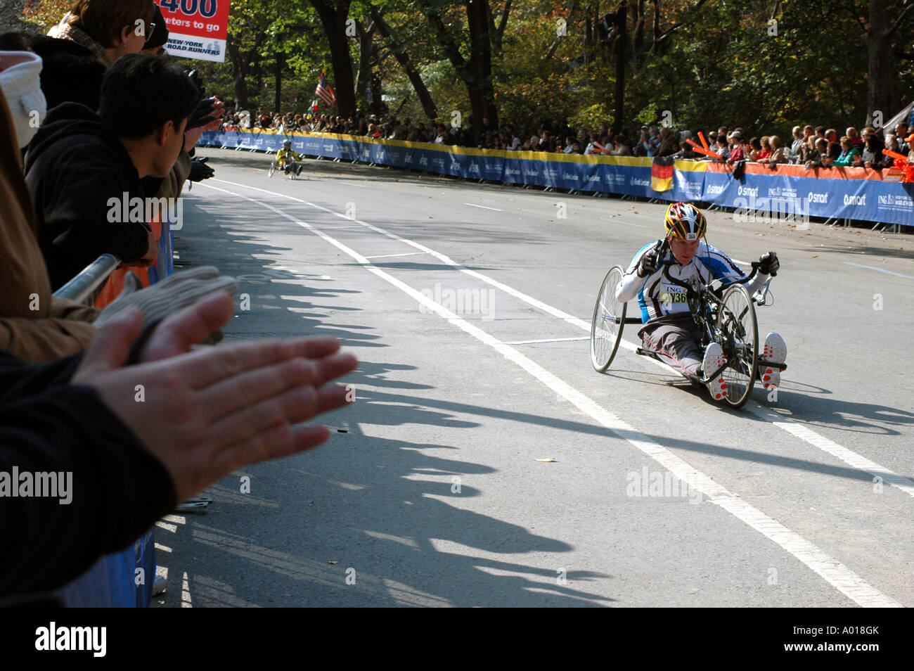 NYC New Yorker giving applause to support a wheelchair athlete Dean ...