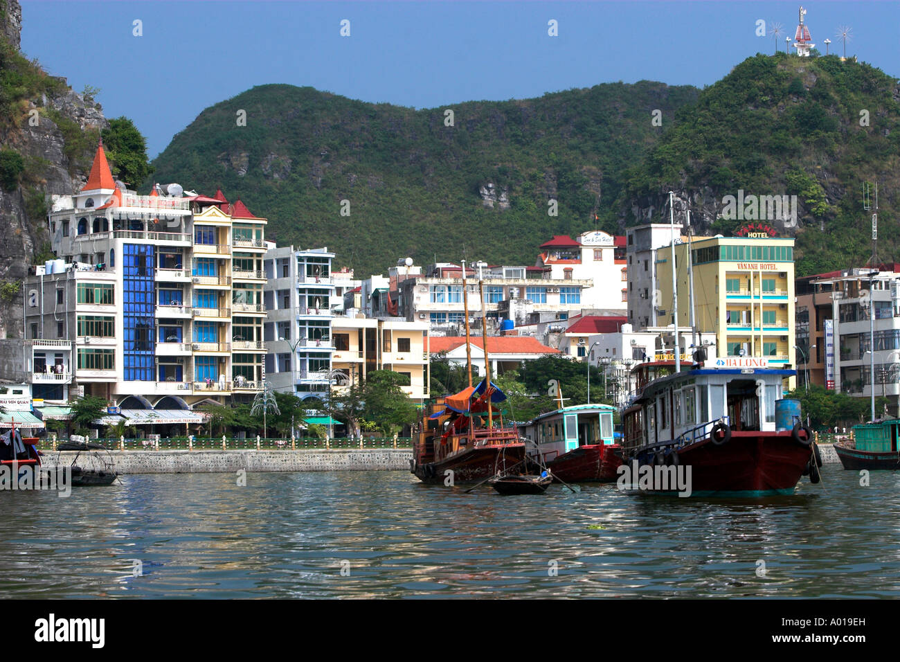 Cruising boats off Cat Ba town Cat Ba Island Vietnam Stock Photo - Alamy