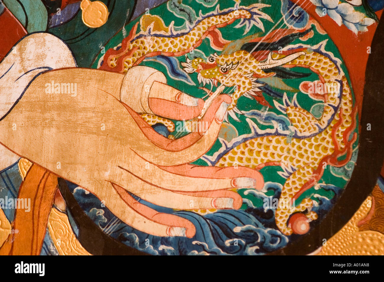 Hands string instrument and dragon close up white Dhristarashtra ...