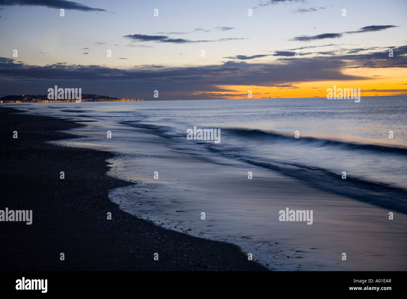 Sunshine on the beach Stock Photo - Alamy