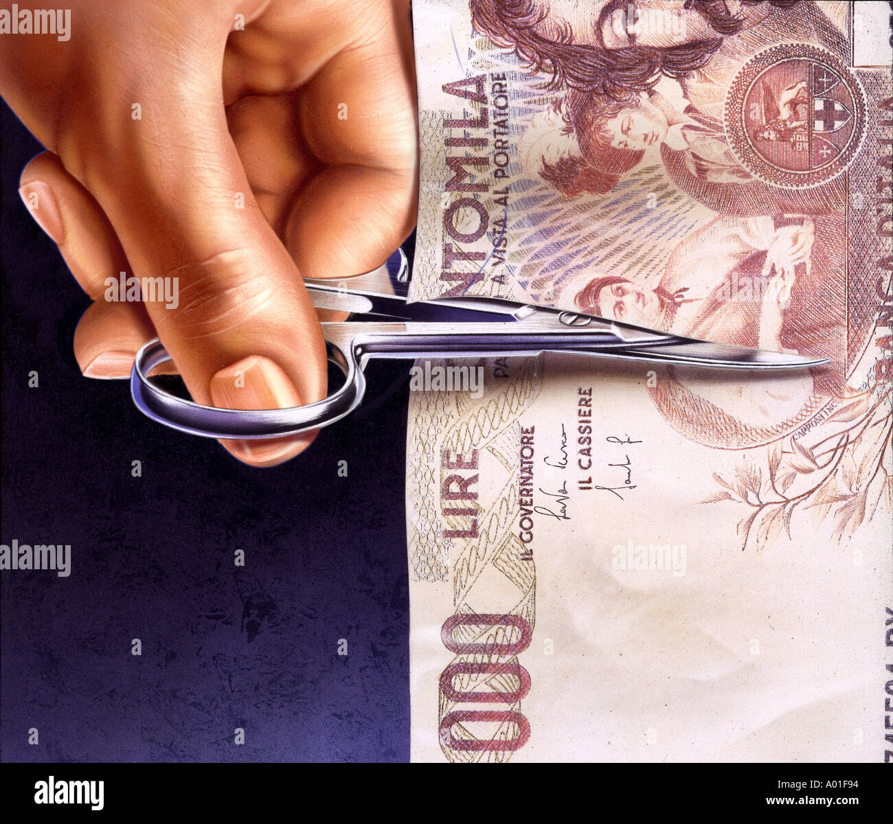 banknote being cut by scissors in hand Stock Photo - Alamy