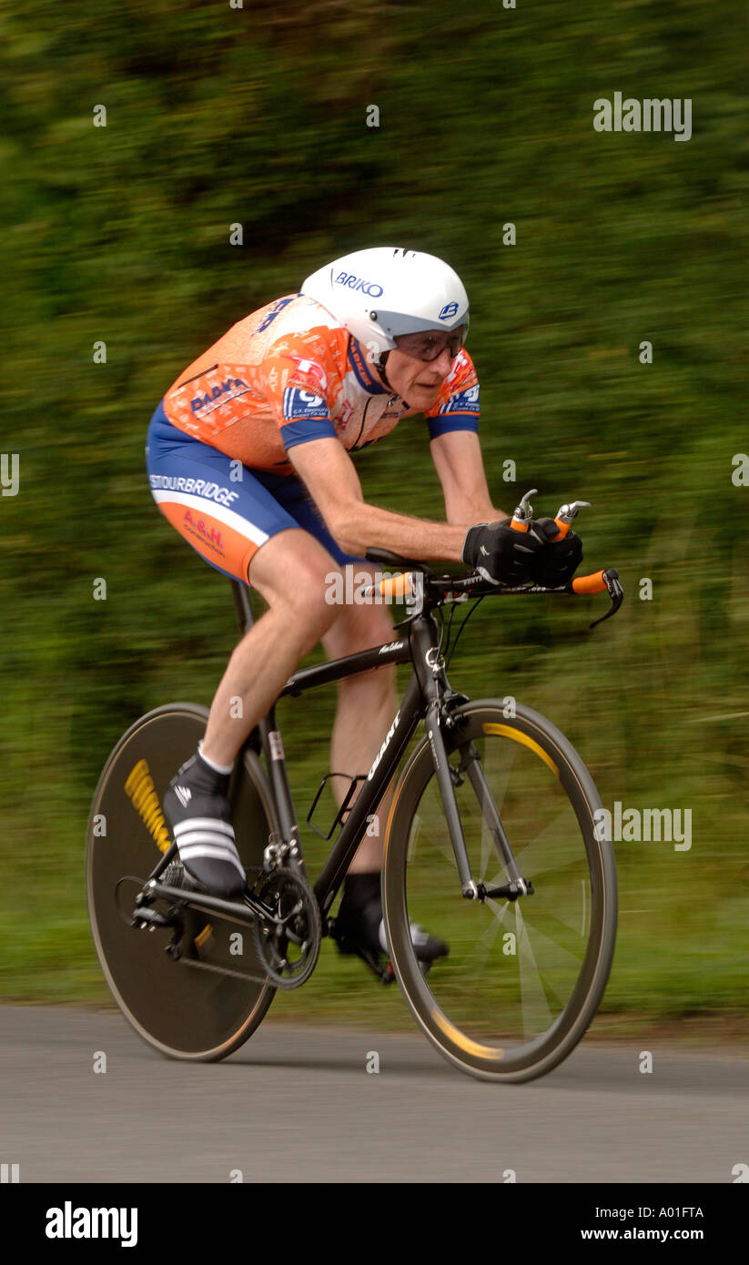 Cyclist competing in a road race time trial Stock Photo - Alamy