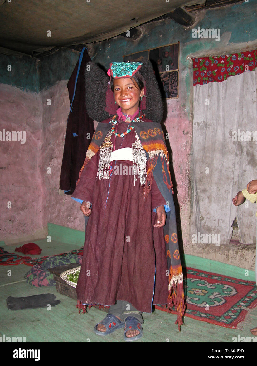 Child wearing the traditional dress of Zanskar in Kumi, Ladakh, Jammu ...