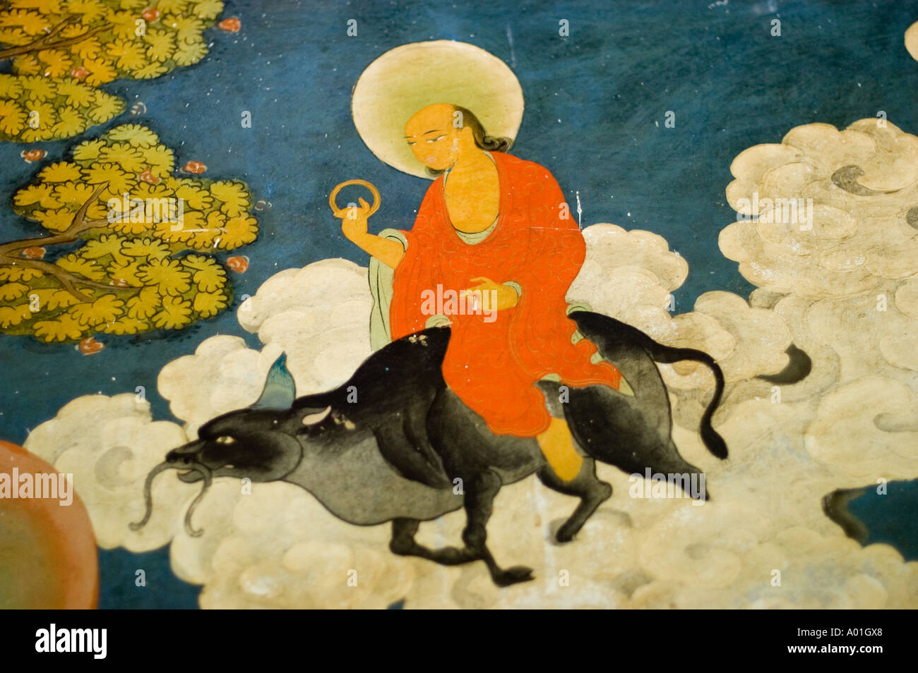 A buddhist lama travelling in air on animal mural paintings in ...