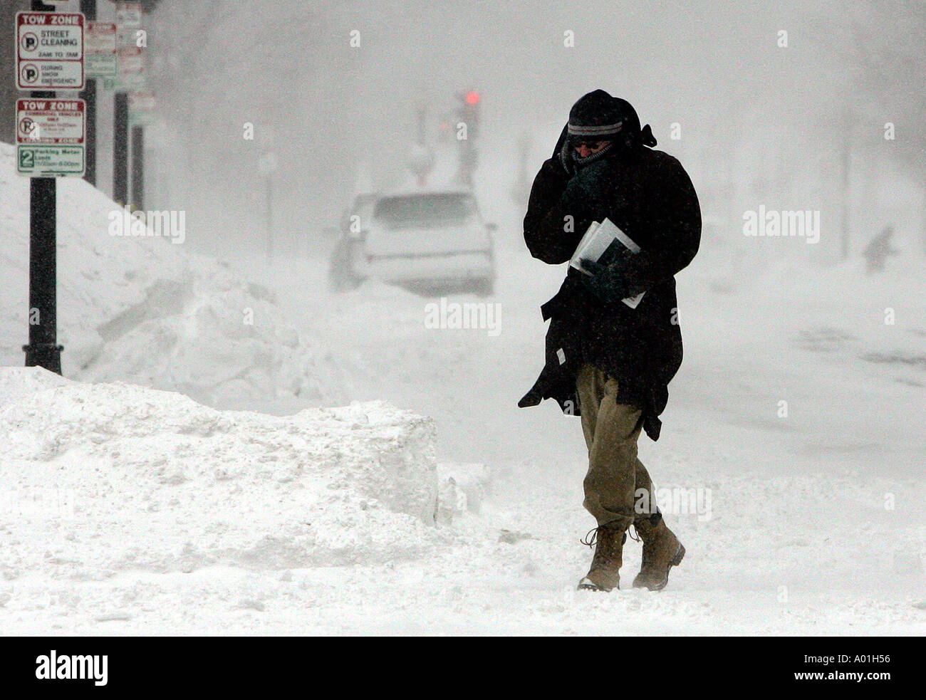 A pedestrian braves a winter storm in Boston Stock Photo - Alamy