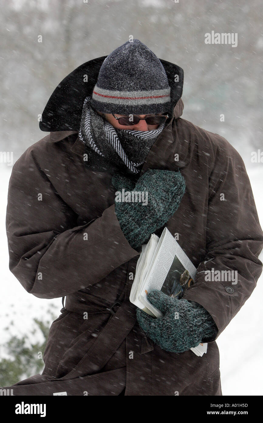 A pedestrian braves a winter storm in Boston Stock Photo - Alamy