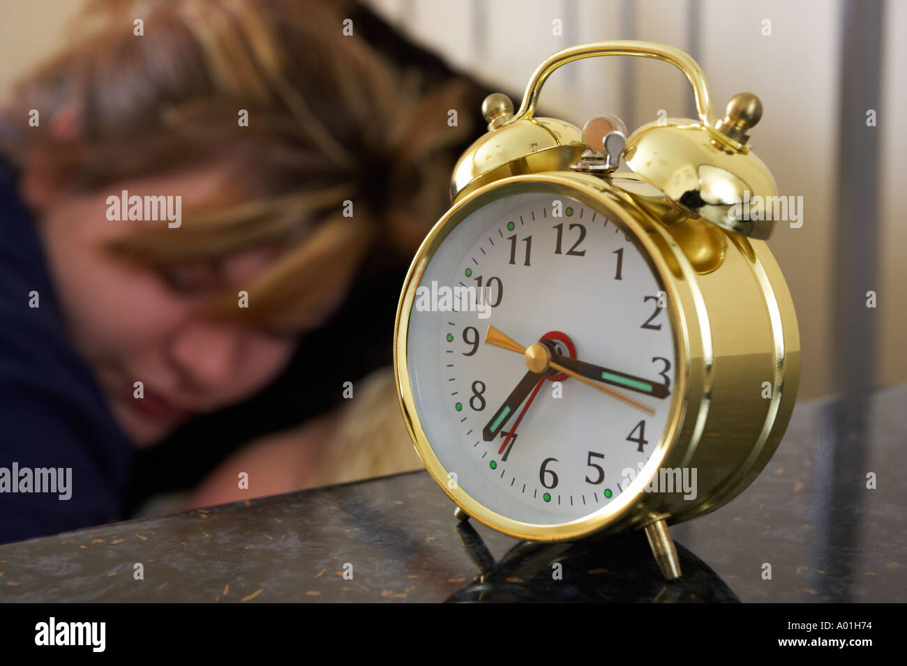 Woman oversleeping Alarm Clock Stock Photo - Alamy