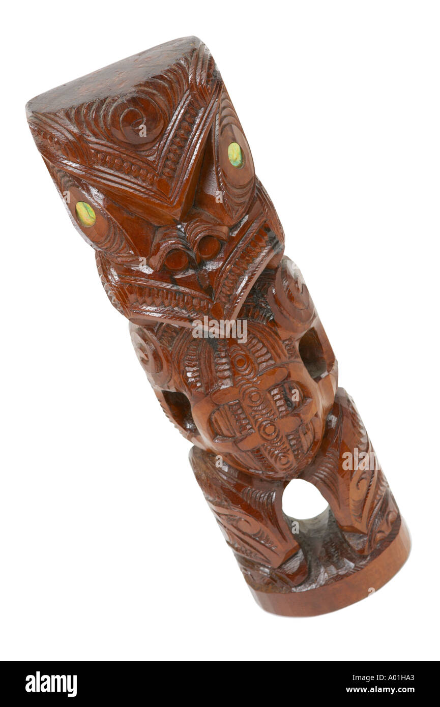 Maori wood carving eyes of Paua Stock Photo - Alamy
