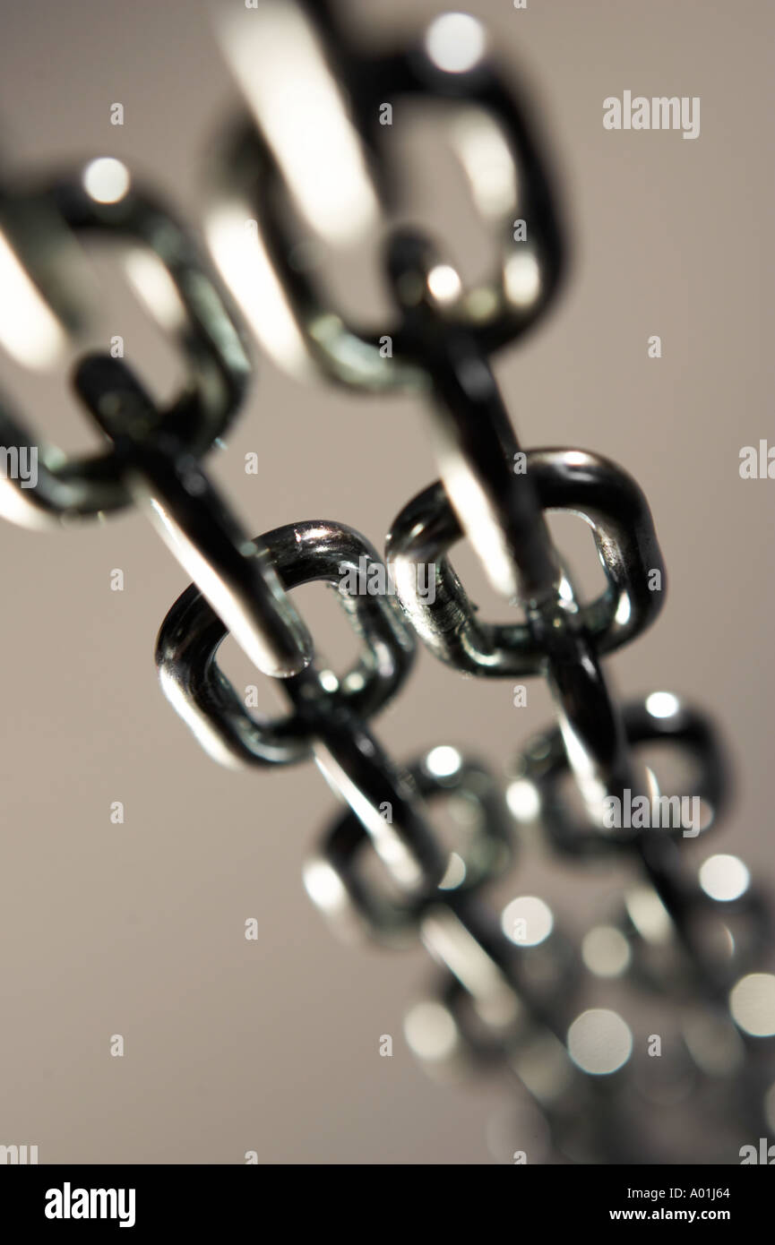 Steel chain hanging abstract Stock Photo - Alamy