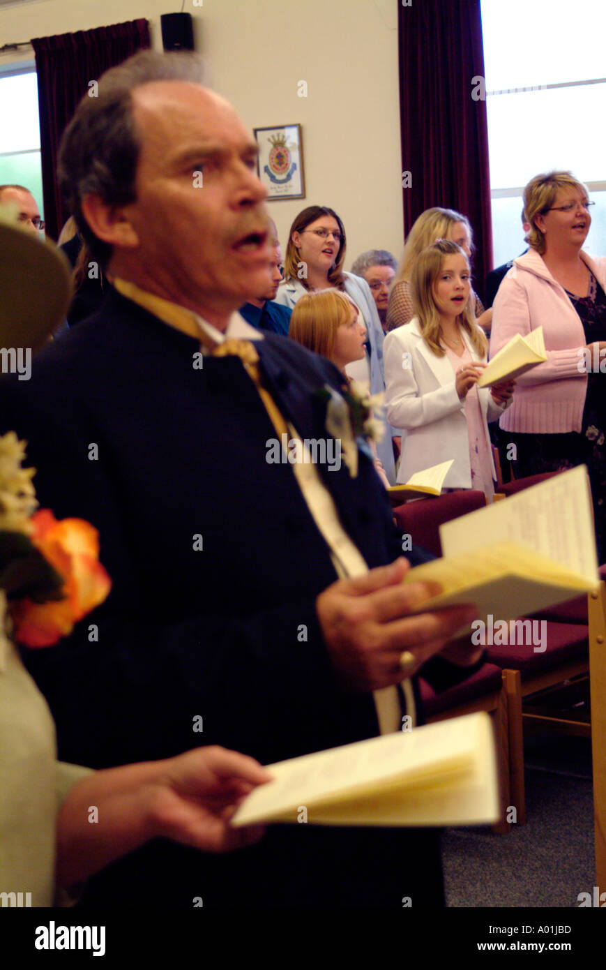 Standing singing at wedding Stock Photo - Alamy