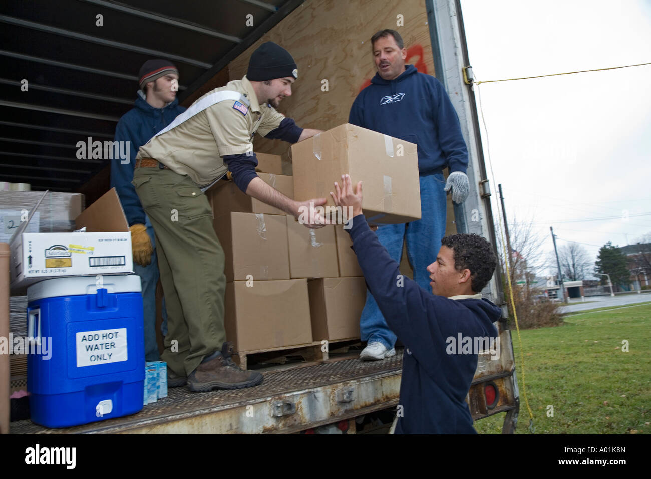Volunteer Pack Donated Food for Food Banks Stock Photo - Alamy