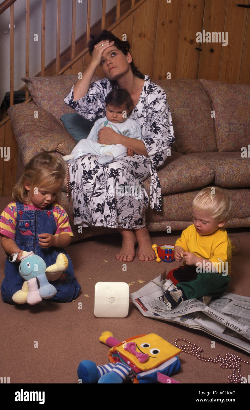 stresssed mother trying to cope Stock Photo - Alamy