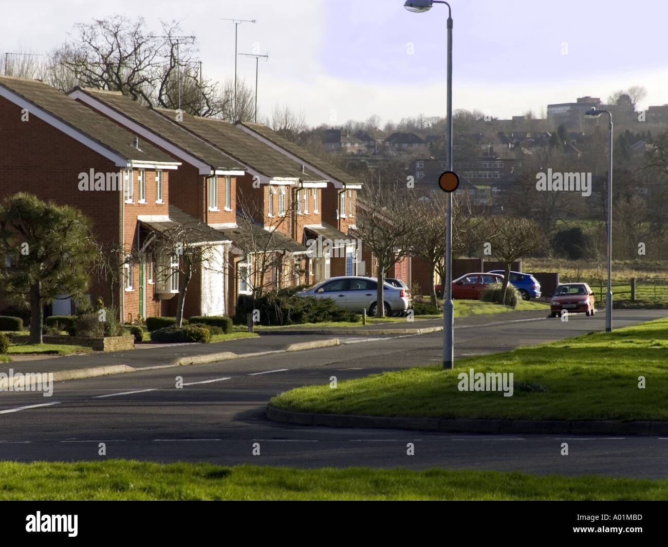 suburban houses with cars on drive Stock Photo - Alamy