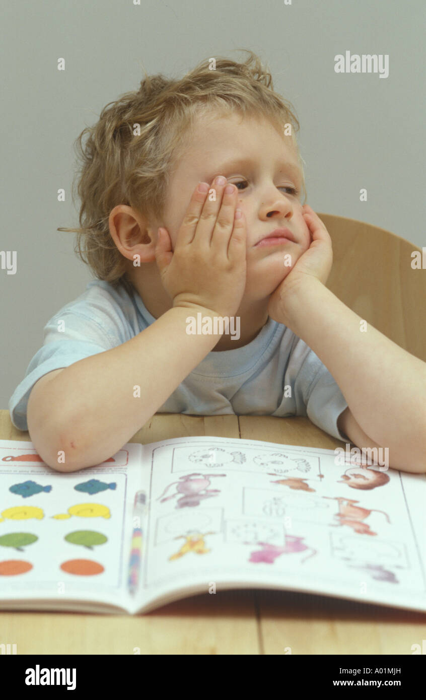 boy looking distracted Stock Photo - Alamy