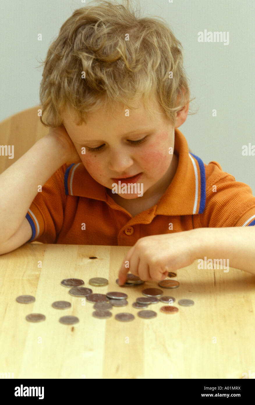 Child counting money sterling hi-res stock photography and images - Alamy