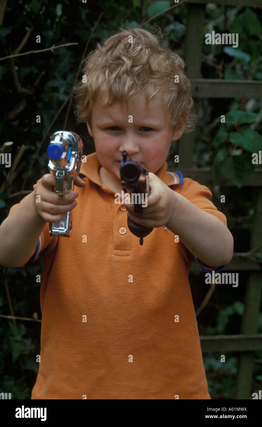 boy with guns Stock Photo - Alamy