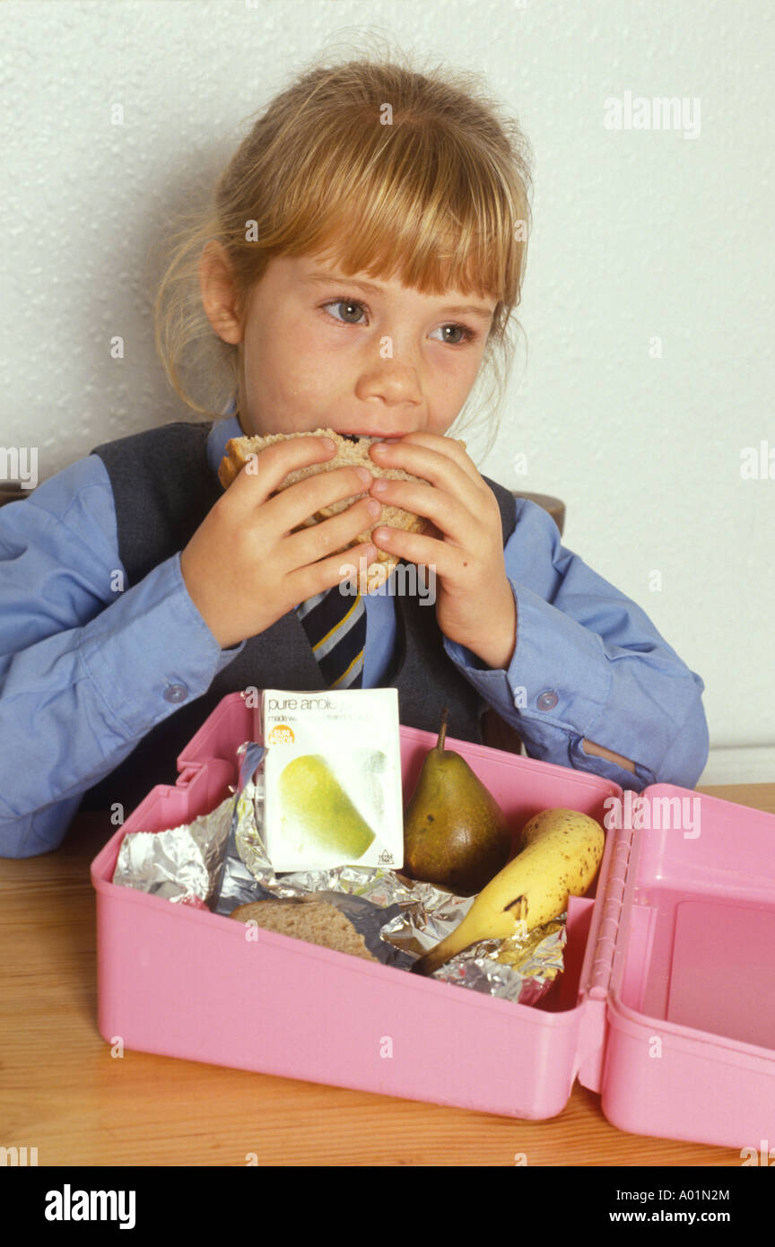 girls eating a healthy pack lunch Stock Photo - Alamy