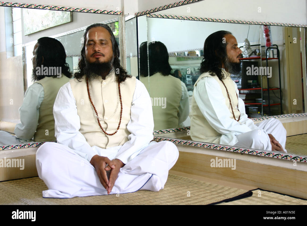 Indian priest sadhu with long hair and beard in meditation Pune ...