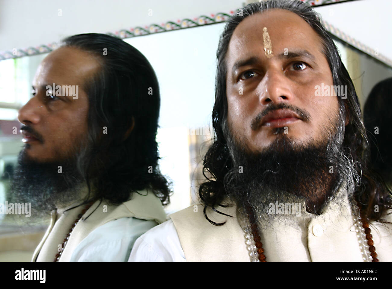 Indian priest sadhu with long hair and beard in trance Pune Maharashtra ...
