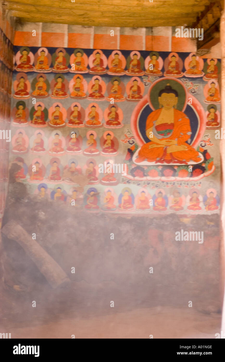 Rays of sun light entering Leh monastery with Buddha mural paintings in ...