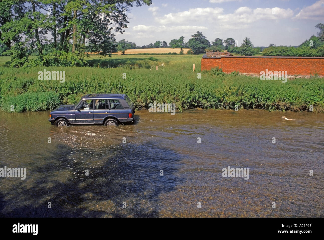 Driving through stream ford hi-res stock photography and images - Alamy