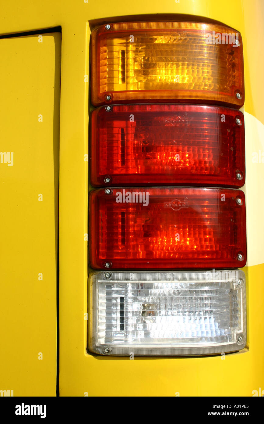 RSC0522 Back light of yellow luxury bus Mumbai Pune Express highway ...