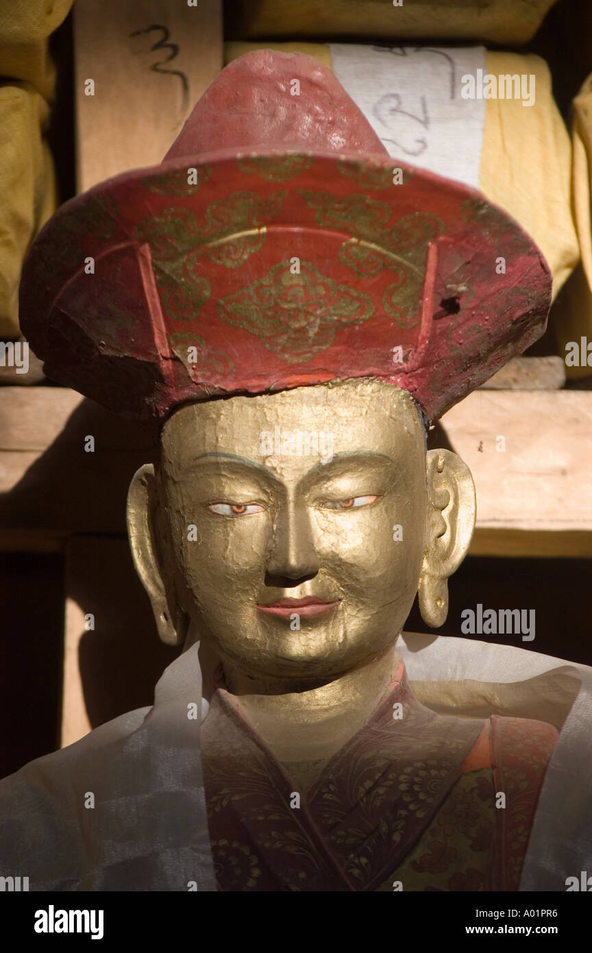 Statue of Lama buddhist teacher with red hat Leh monastery Ladakh Jammu ...