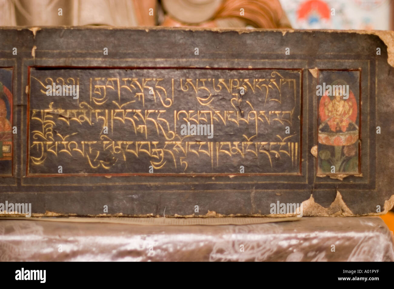 Buddhist holy book with Tibetan or Ladhaki script Leh monastery Ladakh ...