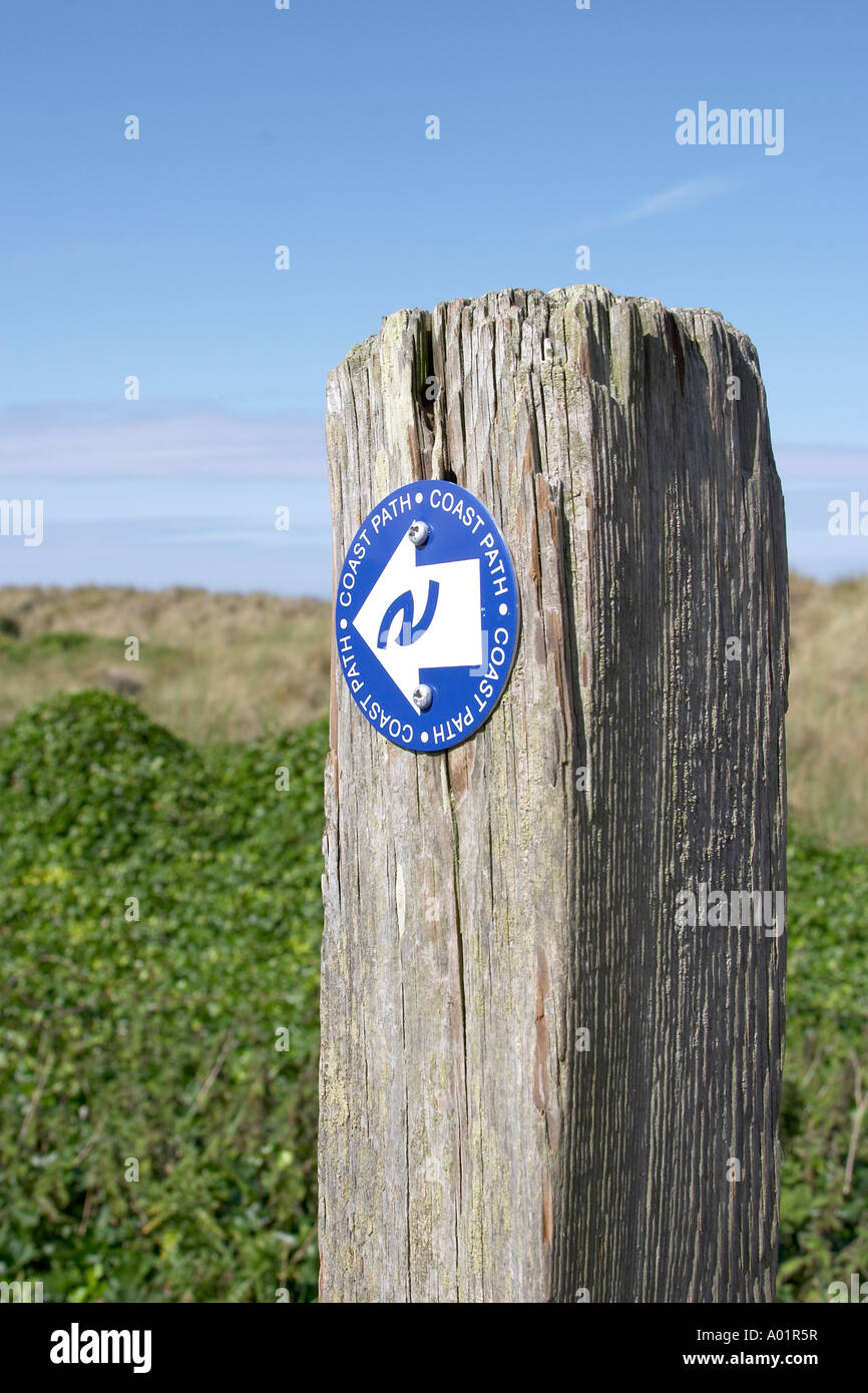Coast path sign on wooden post in sand dune setting Stock Photo - Alamy
