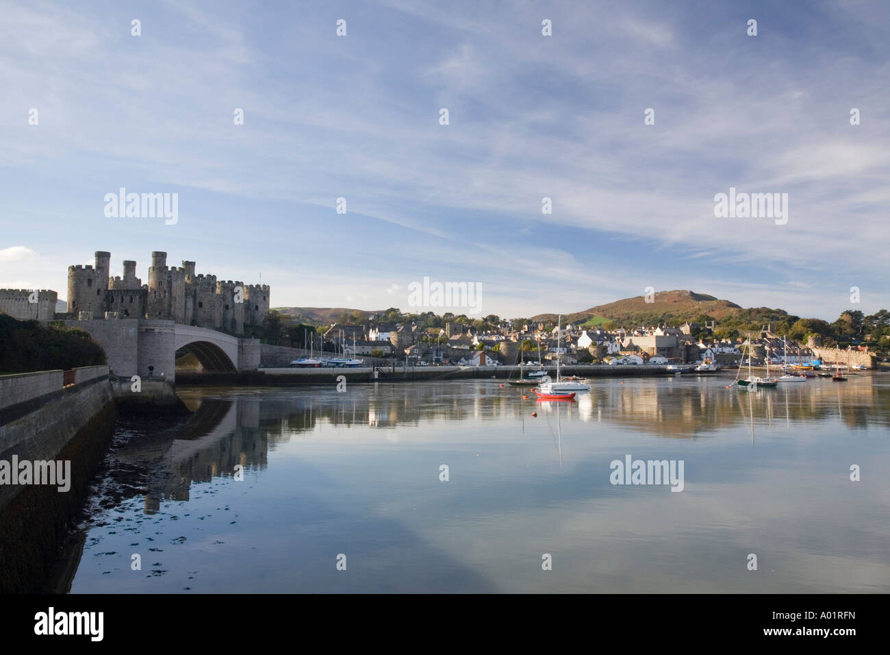 View across Afon Conwy River to 13th century castle and historic walled ...