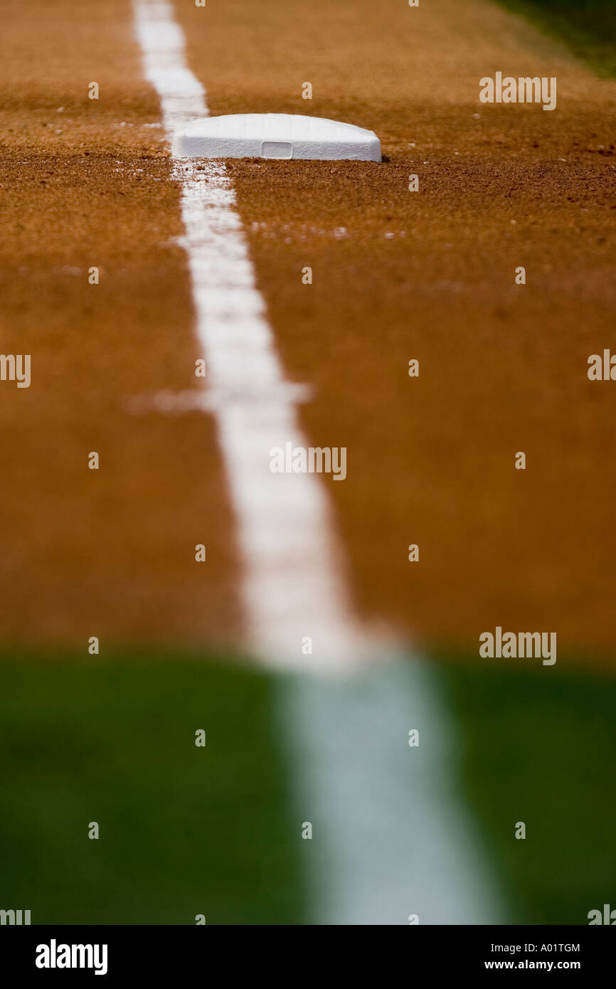 Foul line and base Stock Photo - Alamy