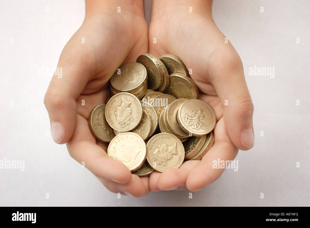 Hand full of Money Stock Photo - Alamy