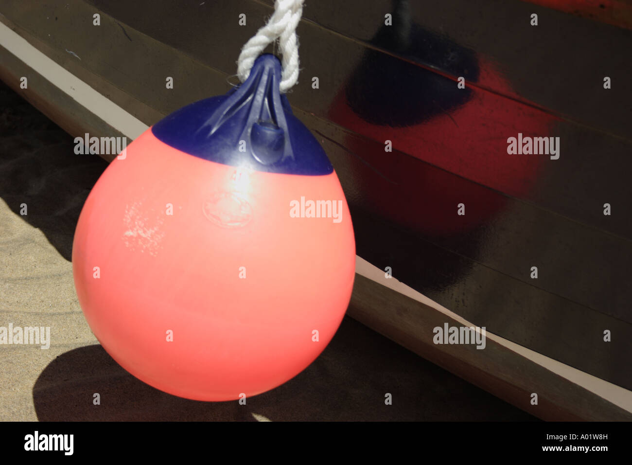 Fishing Boat with marker bouy Stock Photo - Alamy