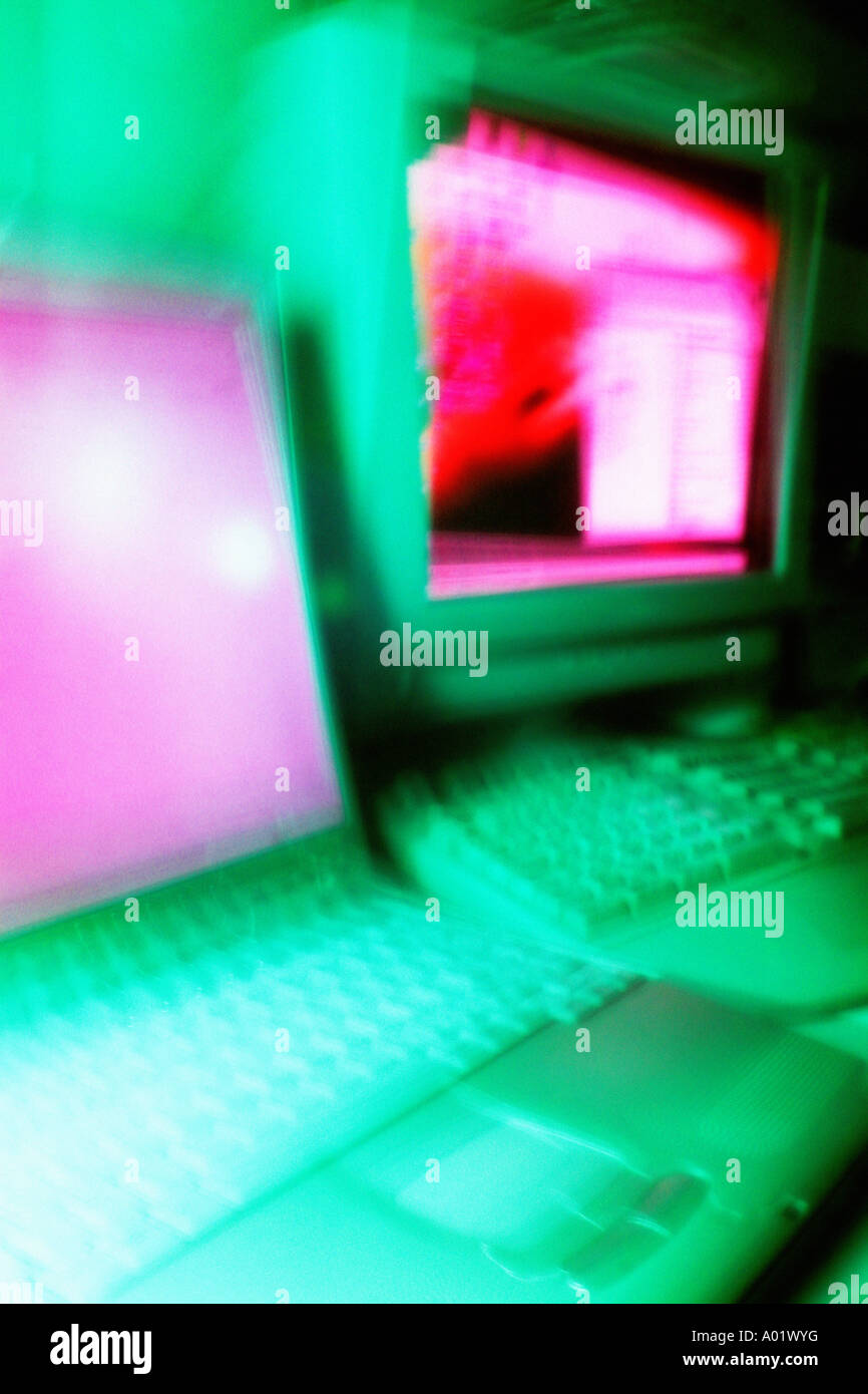 Two computers blurred Stock Photo - Alamy