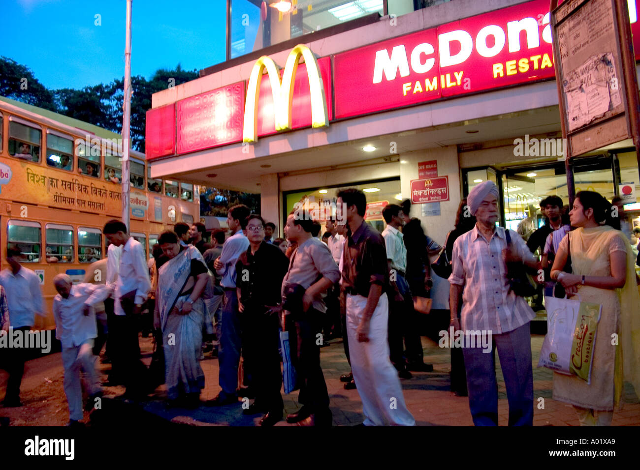 People waiting outside McDonald fastfood worldwide chain store Stock ...