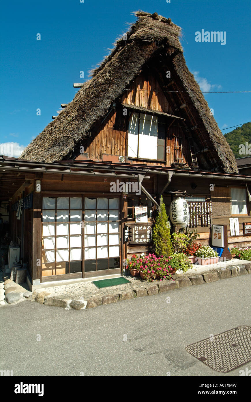 Traditional farmhouse in the Gassho-zukuri style. Historical village of ...
