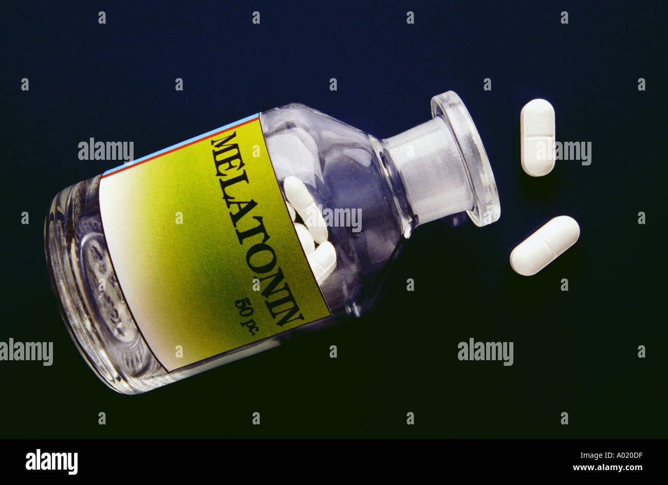 Melatonin pills tablet tube drug Stock Photo - Alamy