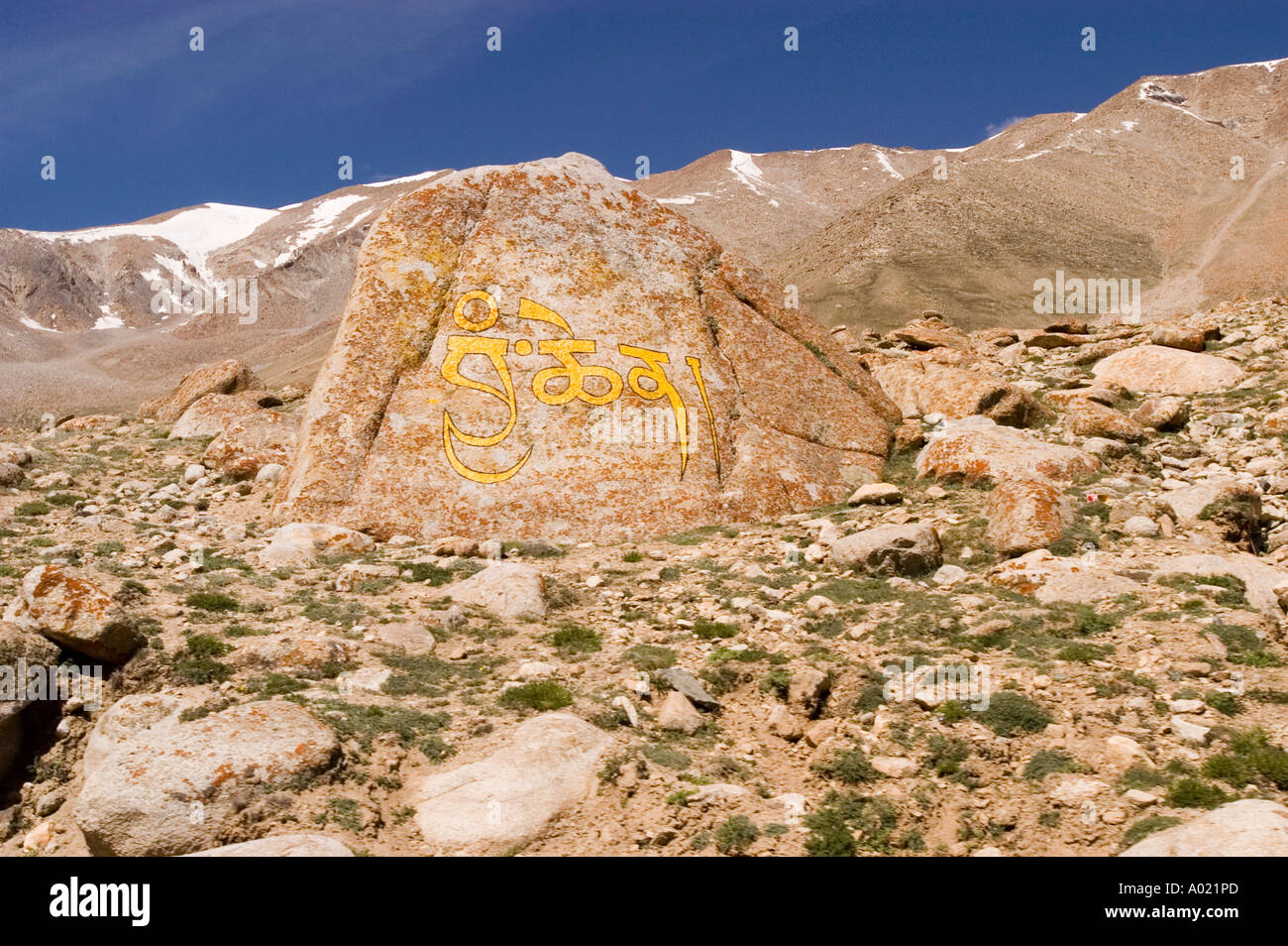 Stone with Tibetan script in Himalayas Stock Photo - Alamy
