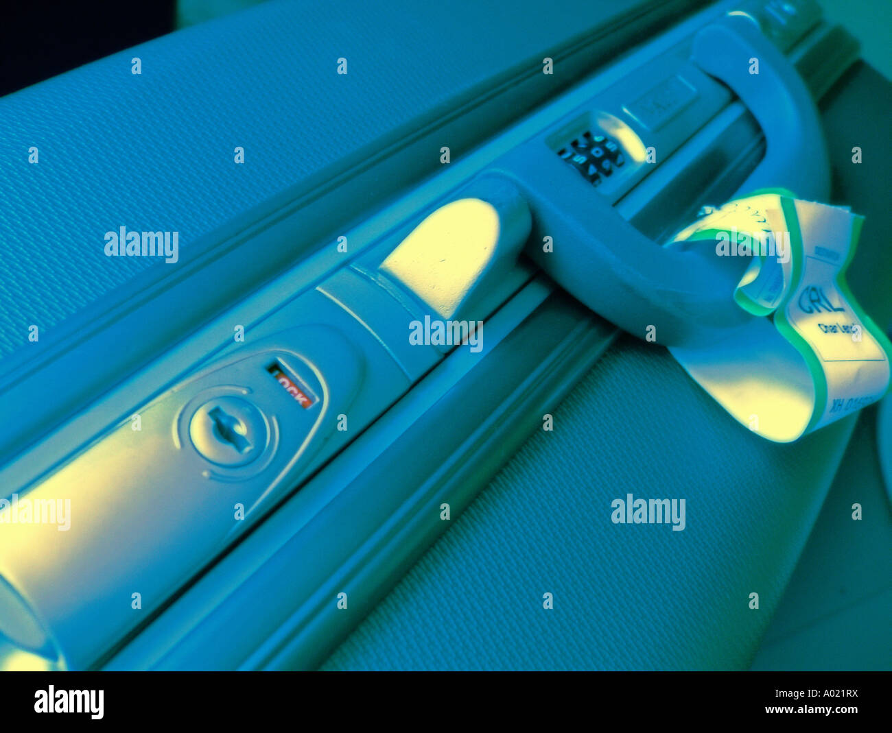 Detail of a suitcase lock and handle Stock Photo - Alamy