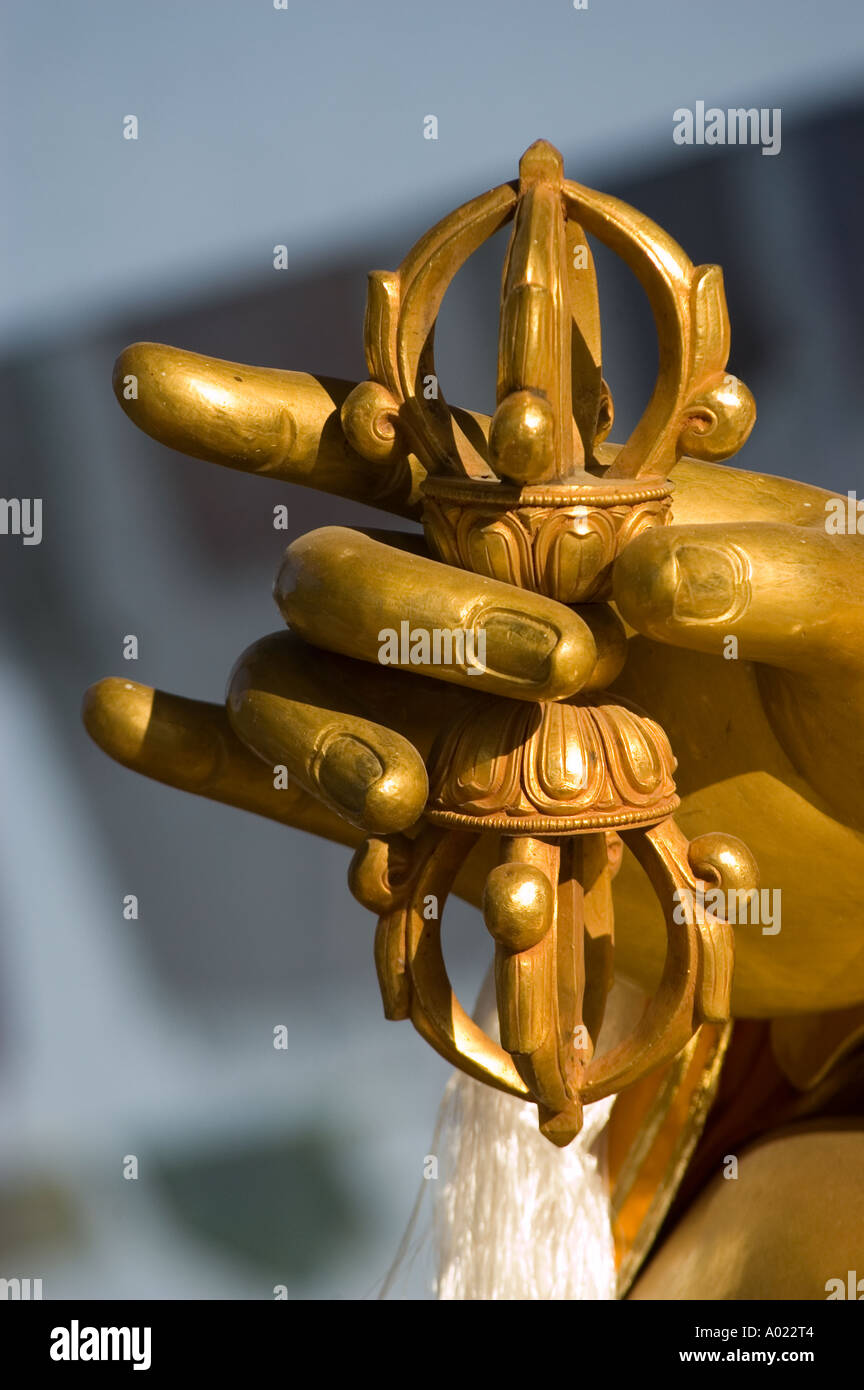 Statue hand with vajra or dorje closeup up of Guru Rinpoche or ...