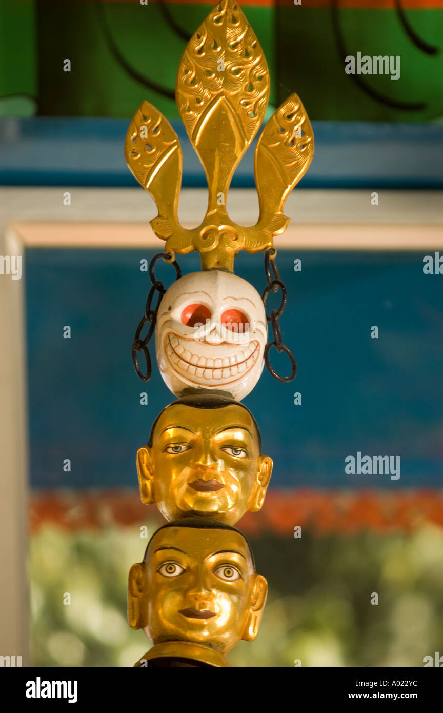 Statue of trident or Kathvanga with human skulls close up of Guru ...