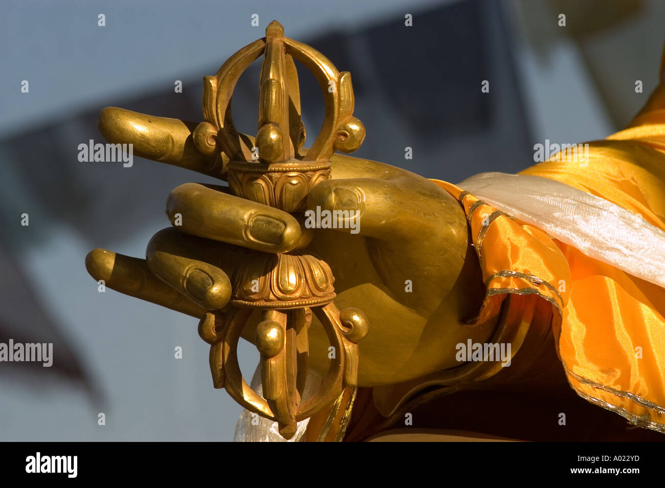 Statue hand vith vajra or dorje closeup up of Guru Rinpoche or ...