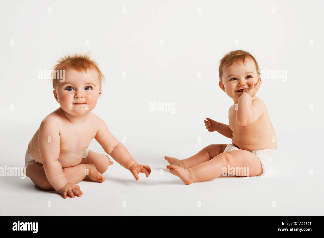 Two Baby Girls Stock Photo - Alamy