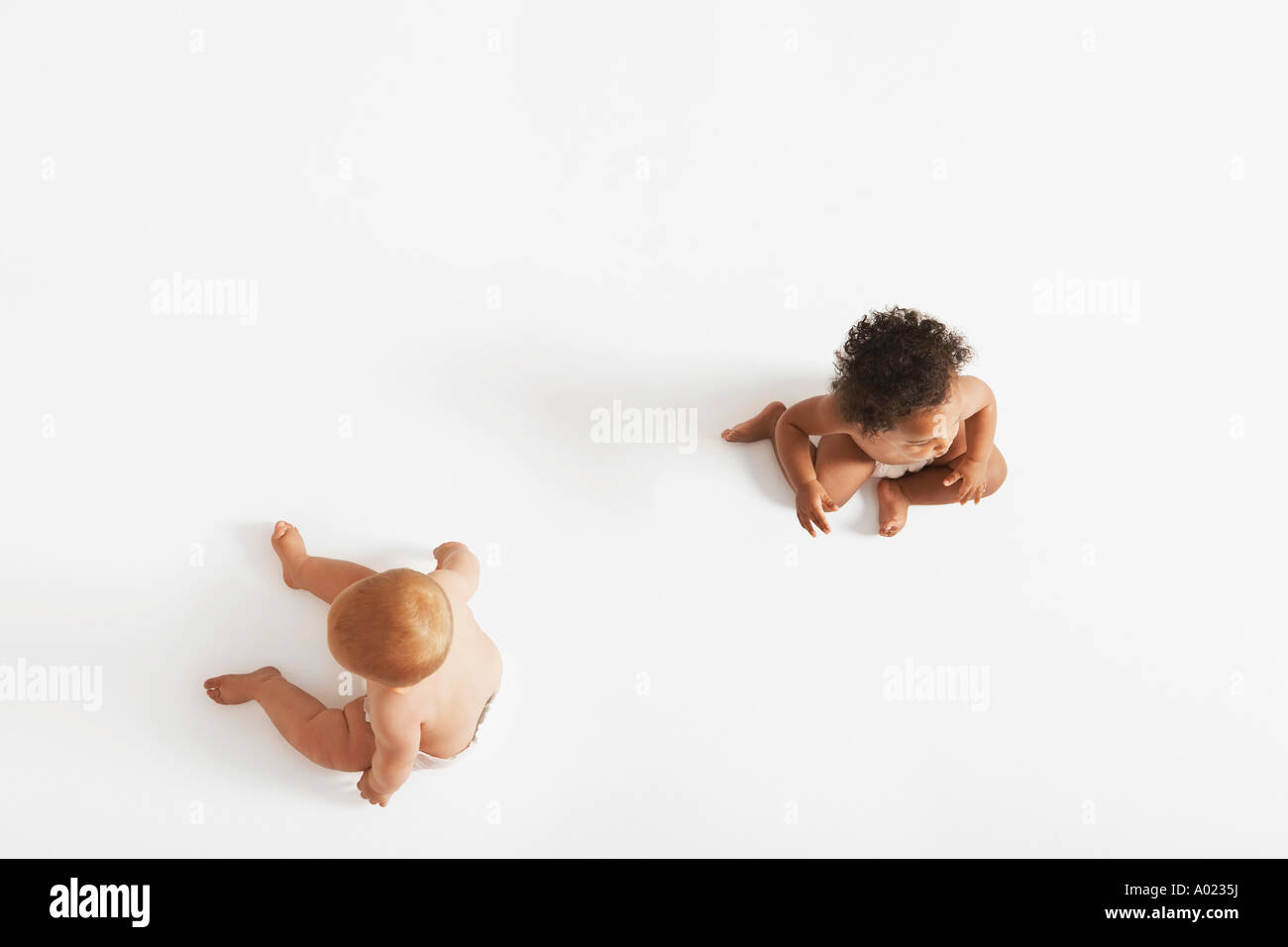 Two Babies from above Stock Photo - Alamy