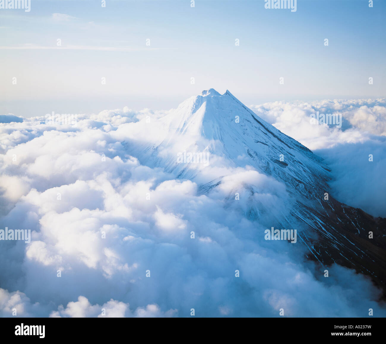 Mountain peak above clouds hi-res stock photography and images - Alamy