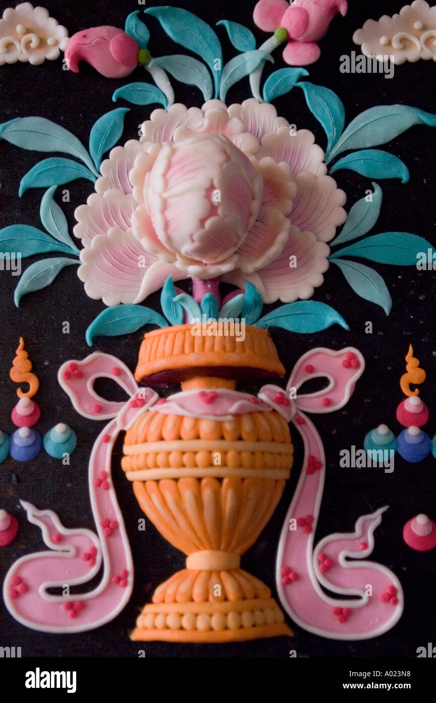 Buddhist auspicious sign vase with banner and flower torma butter ...