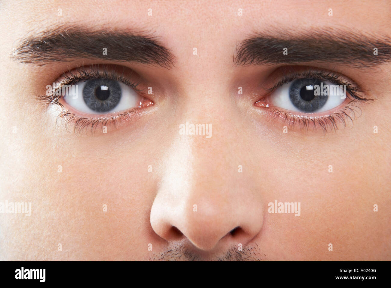 Man with Blue Eyes Stock Photo - Alamy