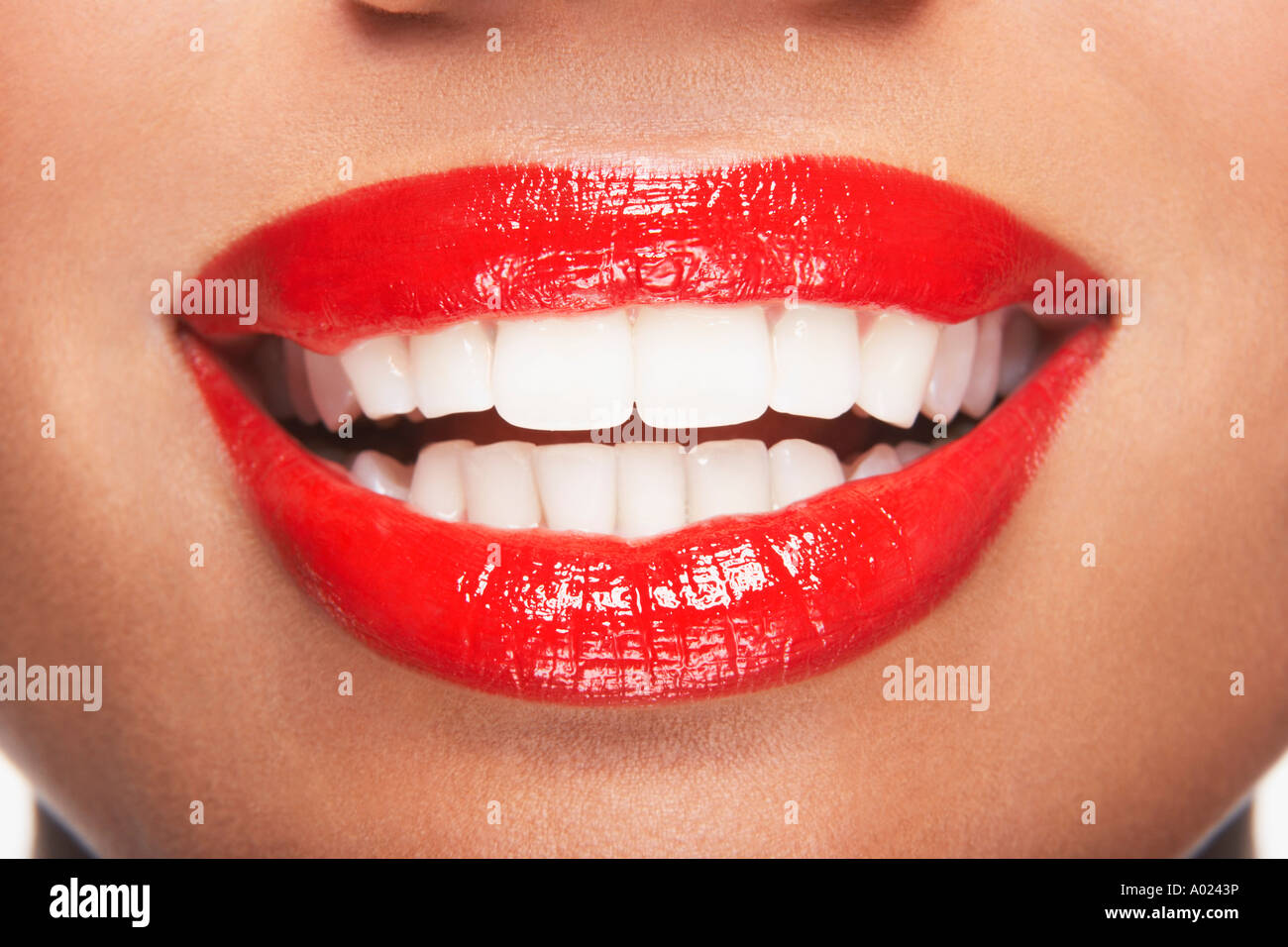 Woman's teeth and mouth with red lipstick Stock Photo - Alamy