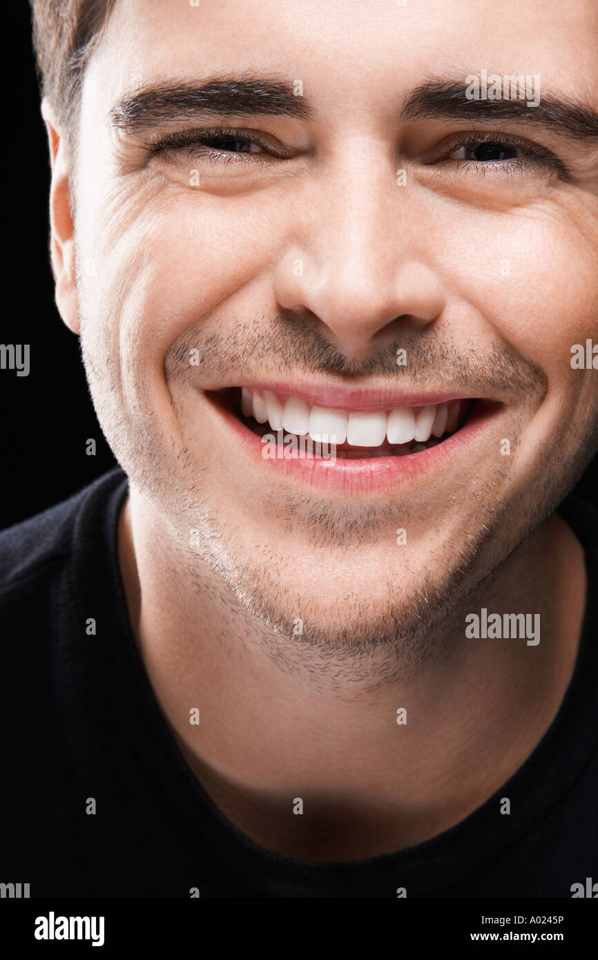 Young man shiny white teeth hi-res stock photography and images - Alamy