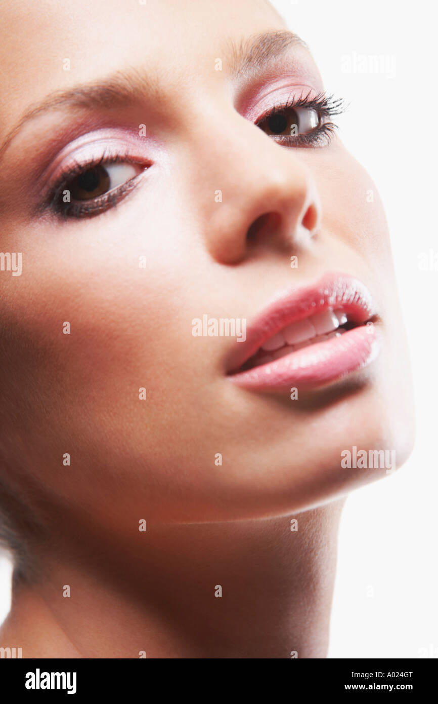 Studio beauty portrait of young woman with head tilted back Stock Photo ...